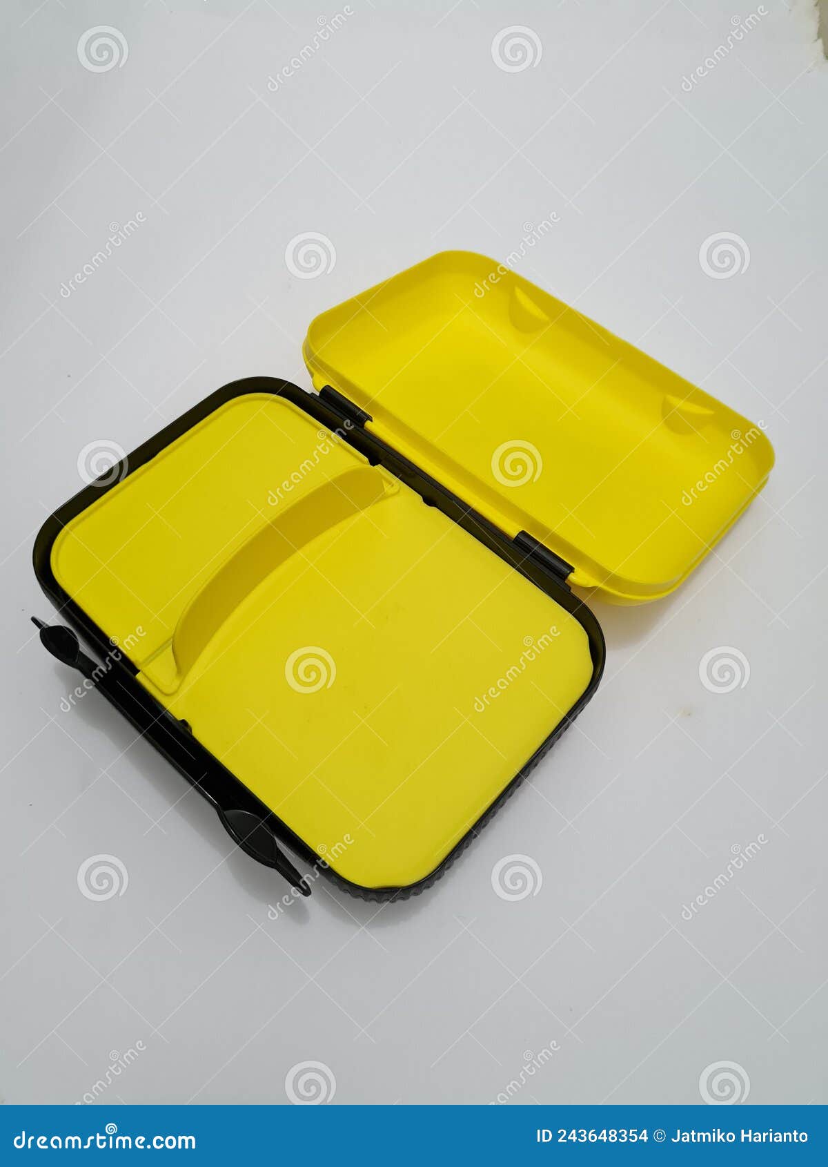 Tupperware Black and Yellow Combination Lunch Box Made of Plastic Stock ...