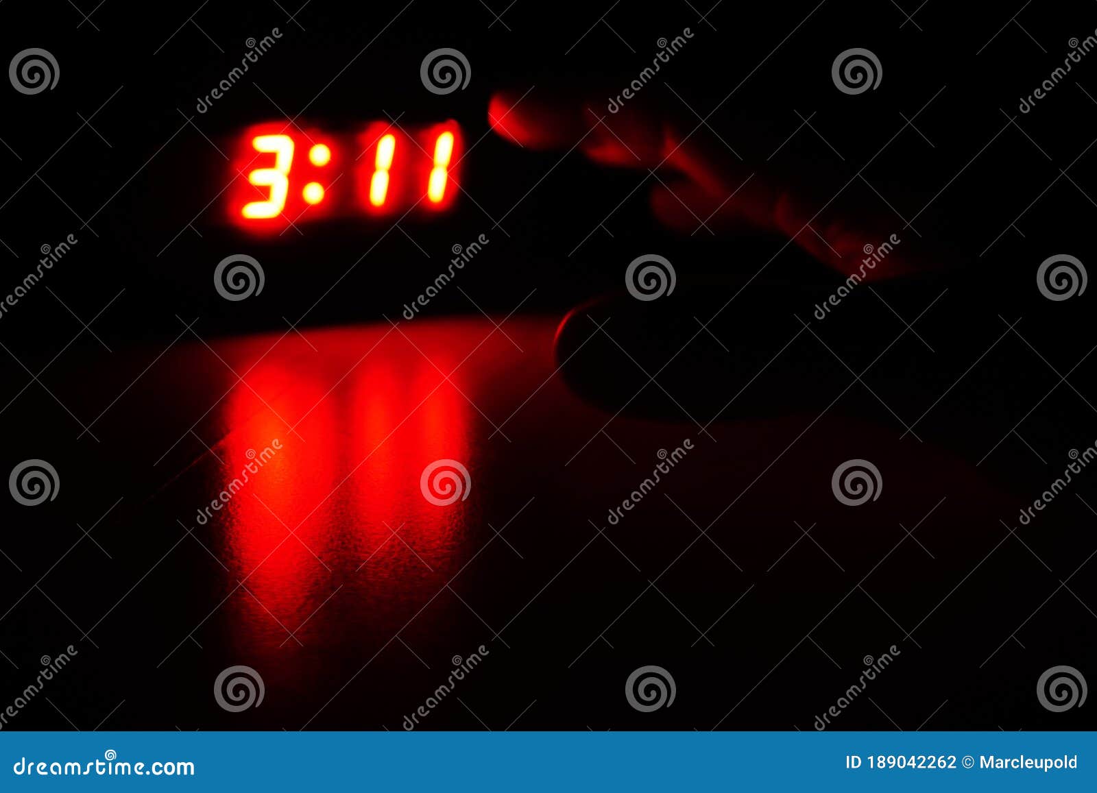 Turning of the alarm clock stock photo. Image of sign - 189042262