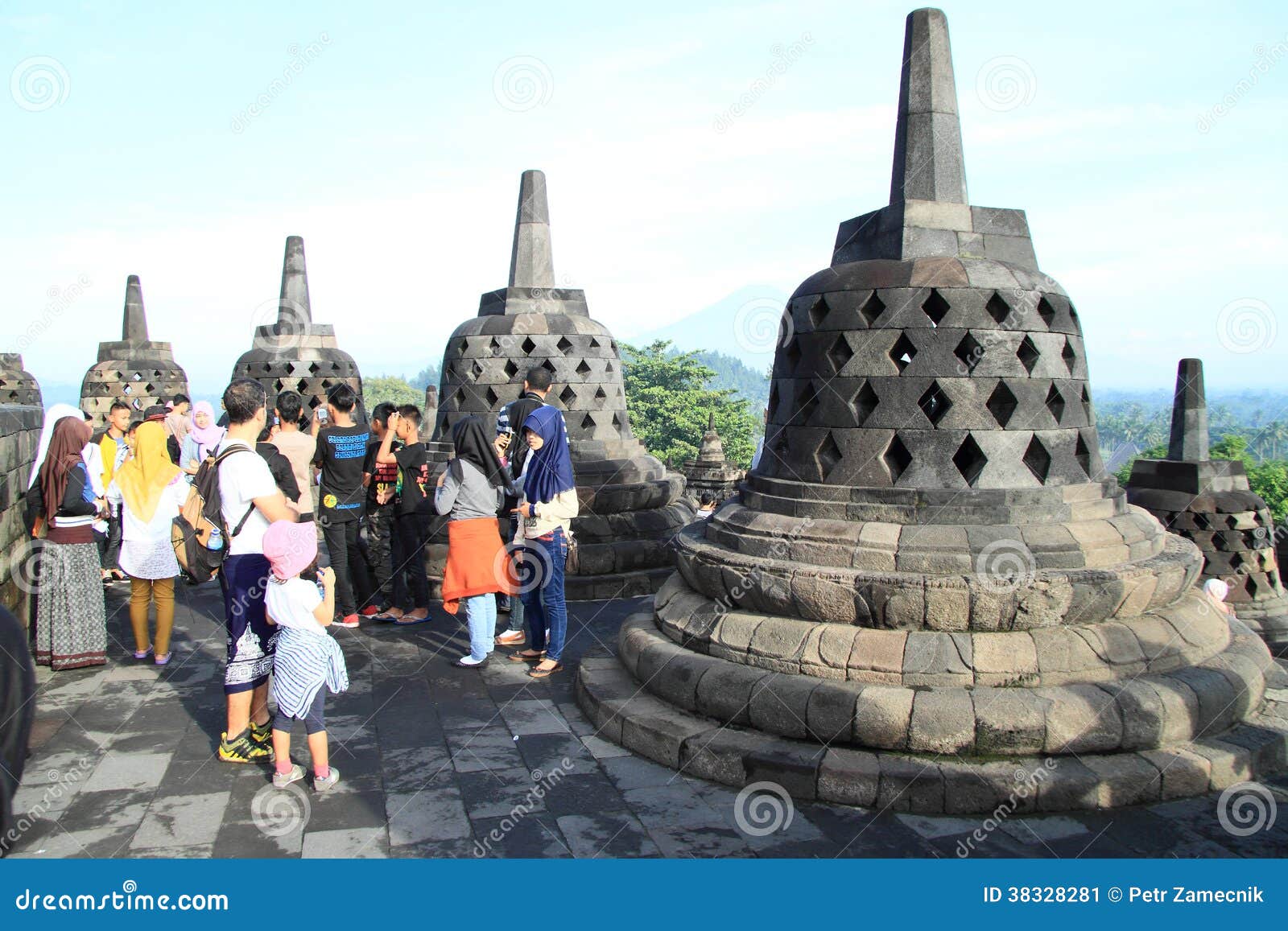 Turists on Borobudur editorial photo. Image of bells - 38328281