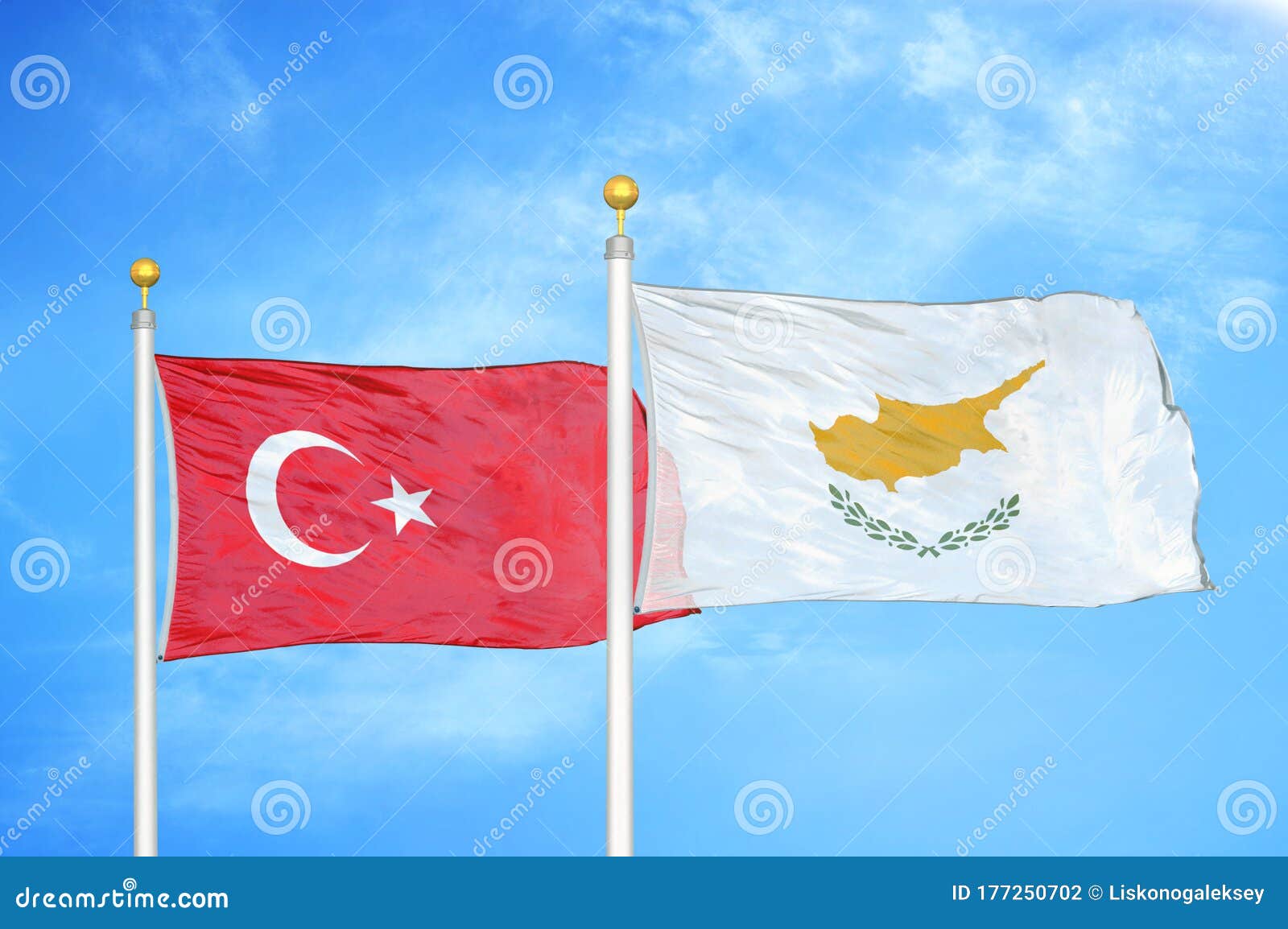 Turkey and Cyprus Two Flags on Flagpoles and Blue Cloudy Sky Stock ...