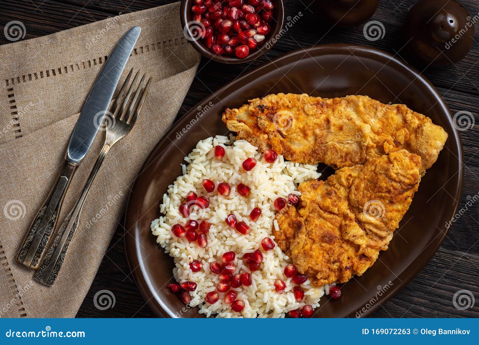 Turkey Schnitzel, Served with Rice and Pomegranate Seeds. Stock Image ...