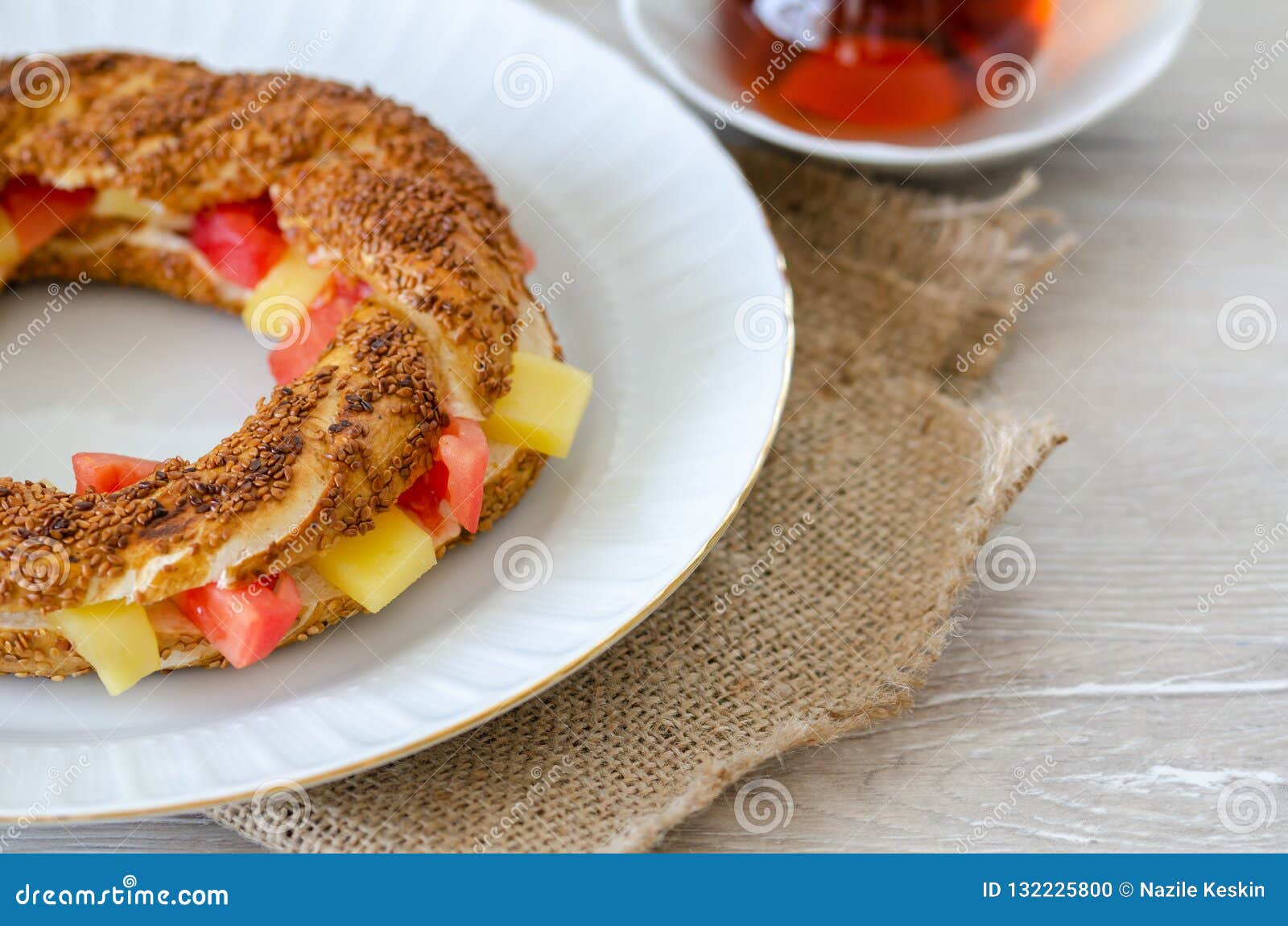 Turkish Breakfast with Cheese, Tomato, Simit, and Tea Stock Photo ...
