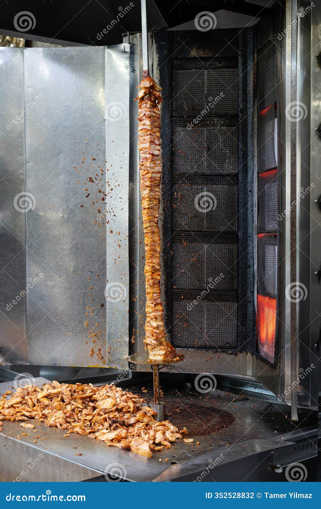 Turkish Chicken Doner Kebab Cooked on an Iron Bar Stock Photo - Image ...