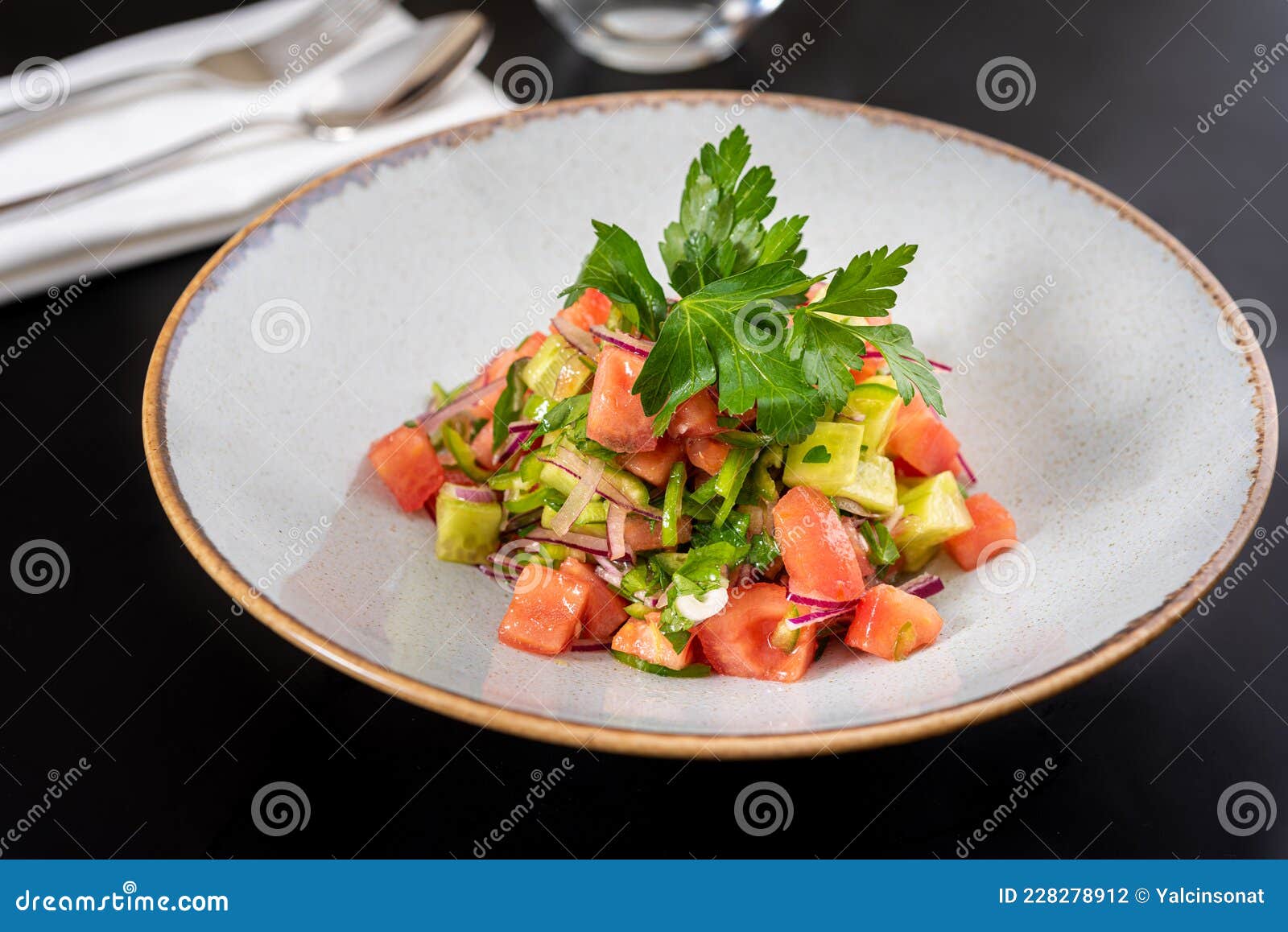 Turkish Coban Choban Salata or Shepherds Salad on Black Table Stock ...