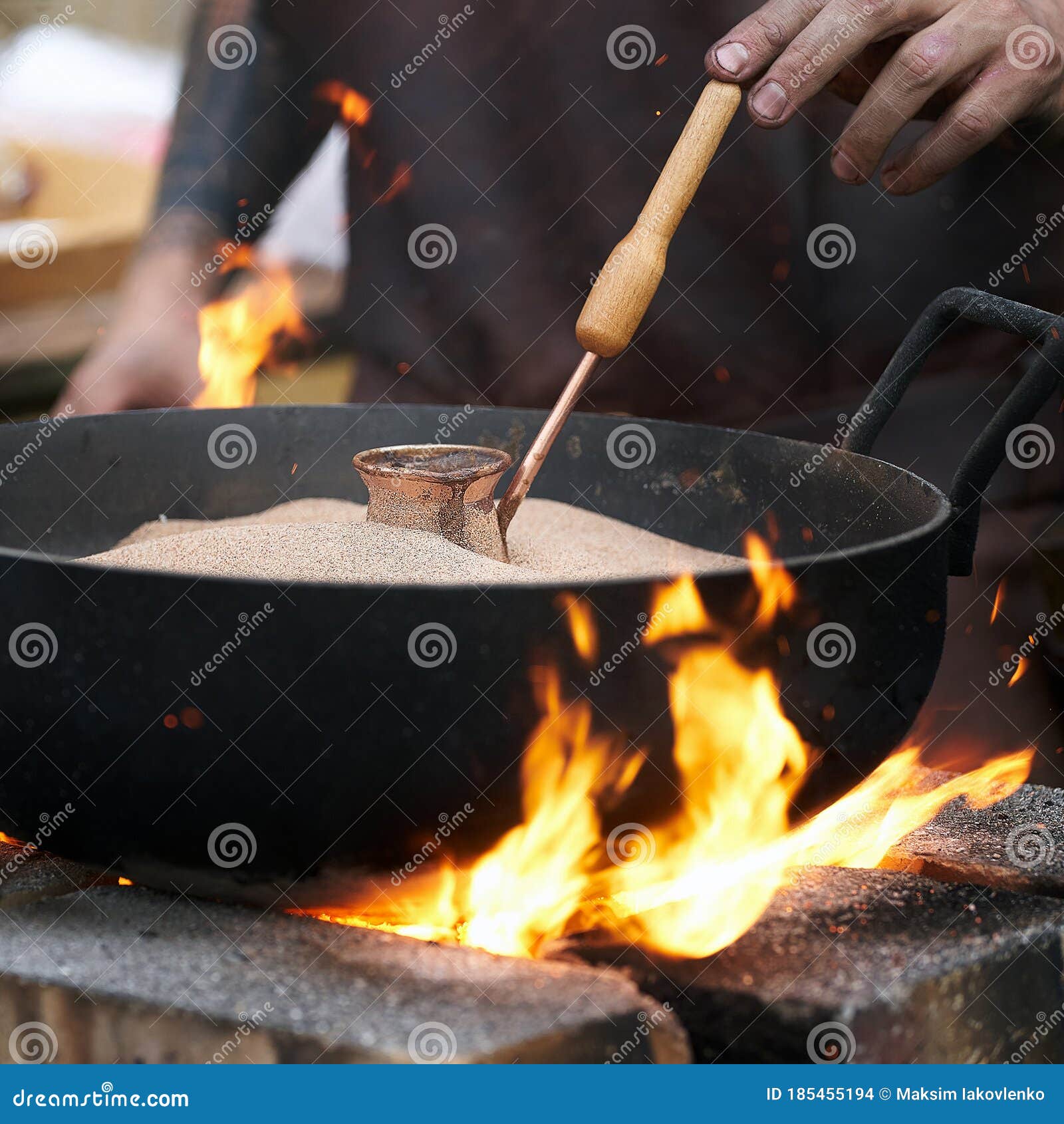 Turkish Coffee Made on a Fire, Man Cooking Turkish Coffee Stock Photo ...
