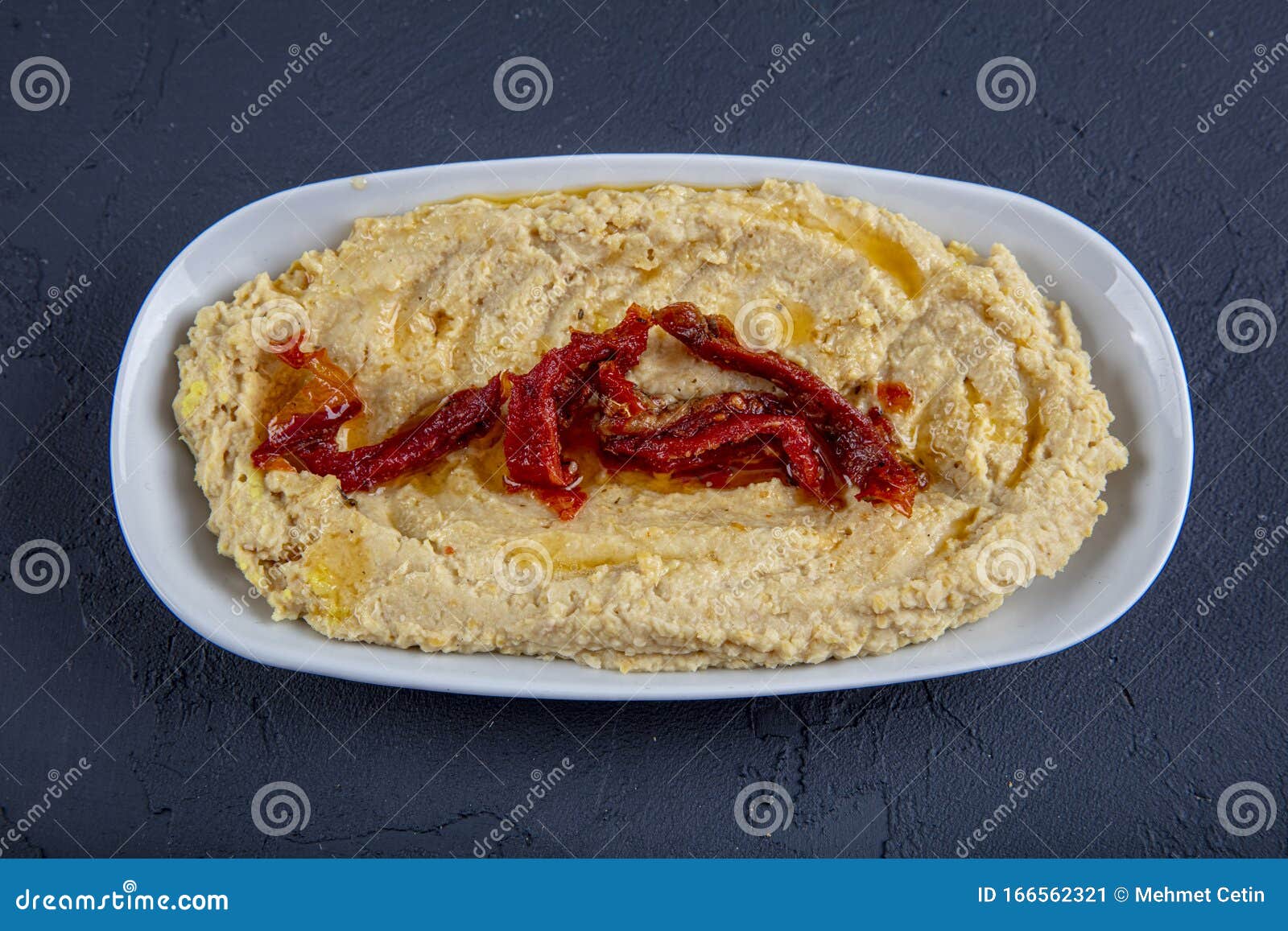 Turkish Cuisine Appetizers; Humus. Humus with Celery Sticks Stock Image ...