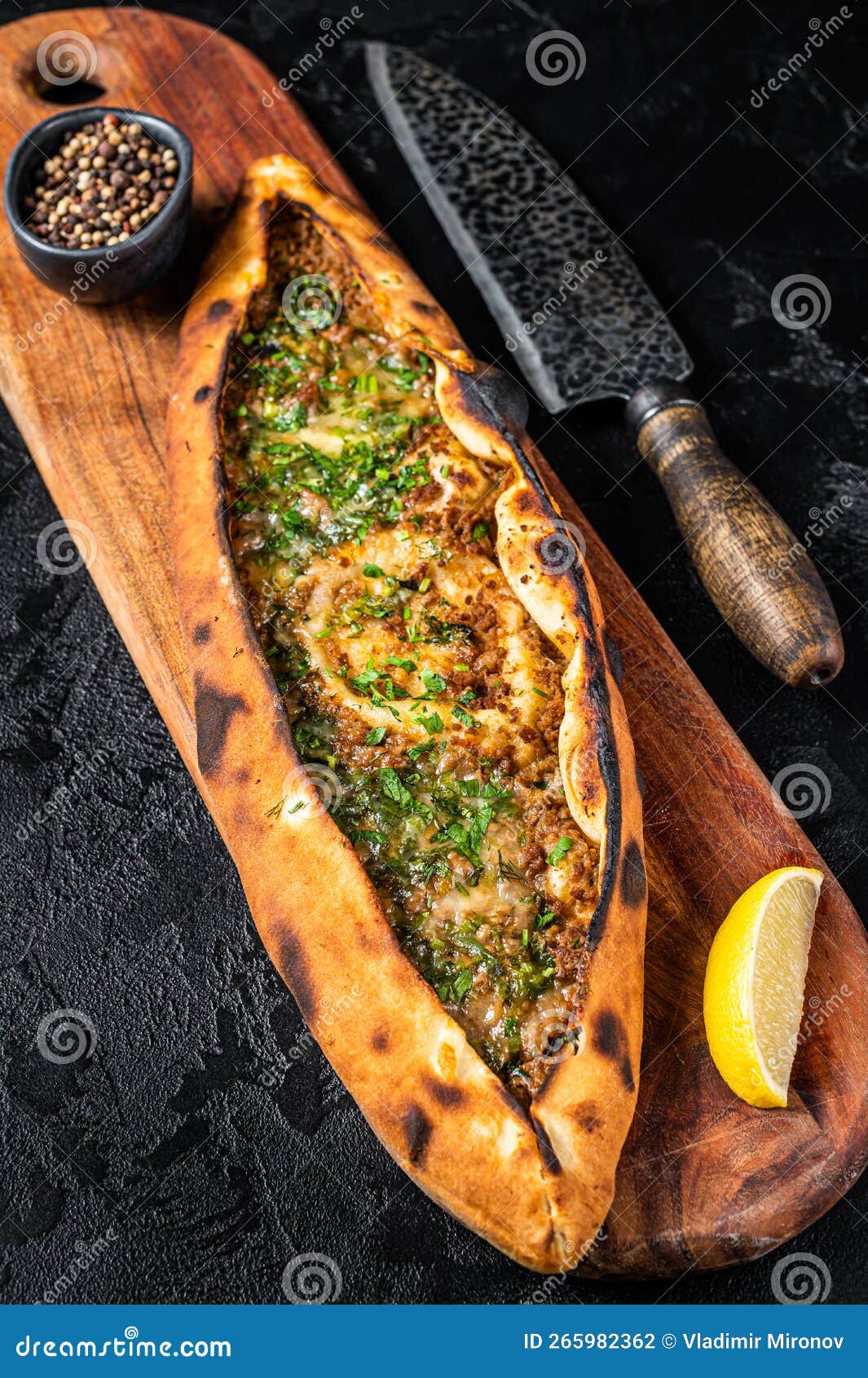 Turkish Pide Pie with Beef Meat and Vegetables. Black Background Stock ...