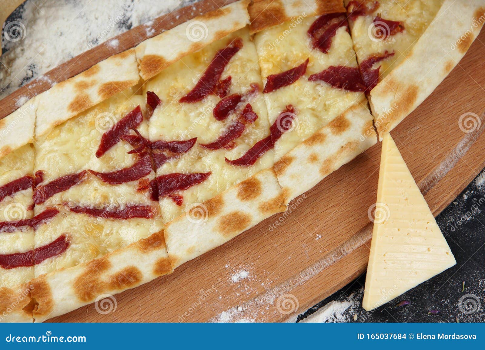 Turkish Pizza Called Pide in the Shape of a Boat Stuffed with Jerky and ...