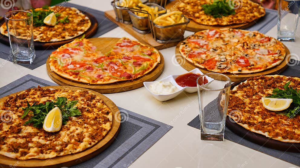 Turkish Pizza and Sides on a Restaurant Table Stock Image - Image of ...