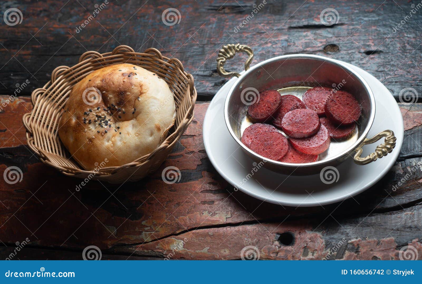 Turkish Sausage Sucuk and Bread Roll on Rustic Wooden Table Stock Photo ...