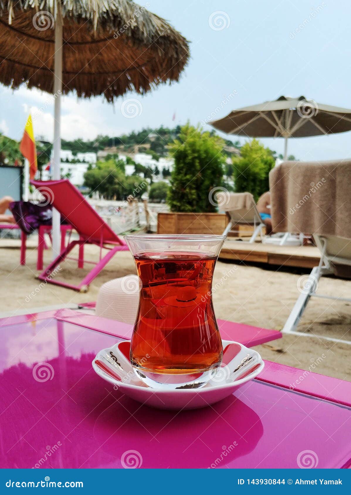 Turkish tea with beach stock photo. Image of vertical - 143930844