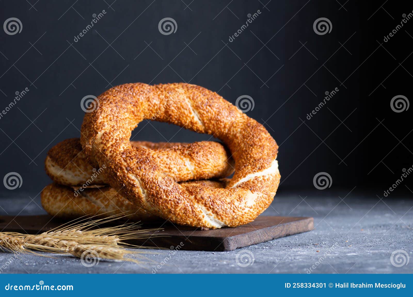 Turkish Traditional Bagel / Simit with Sesame on Rustic Table Stock ...