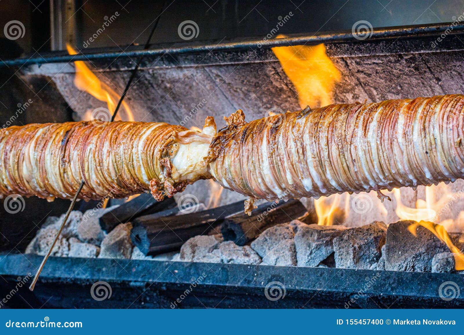 Turkish Traditional Food Kokorec Roasting on the Fire Stock Photo ...