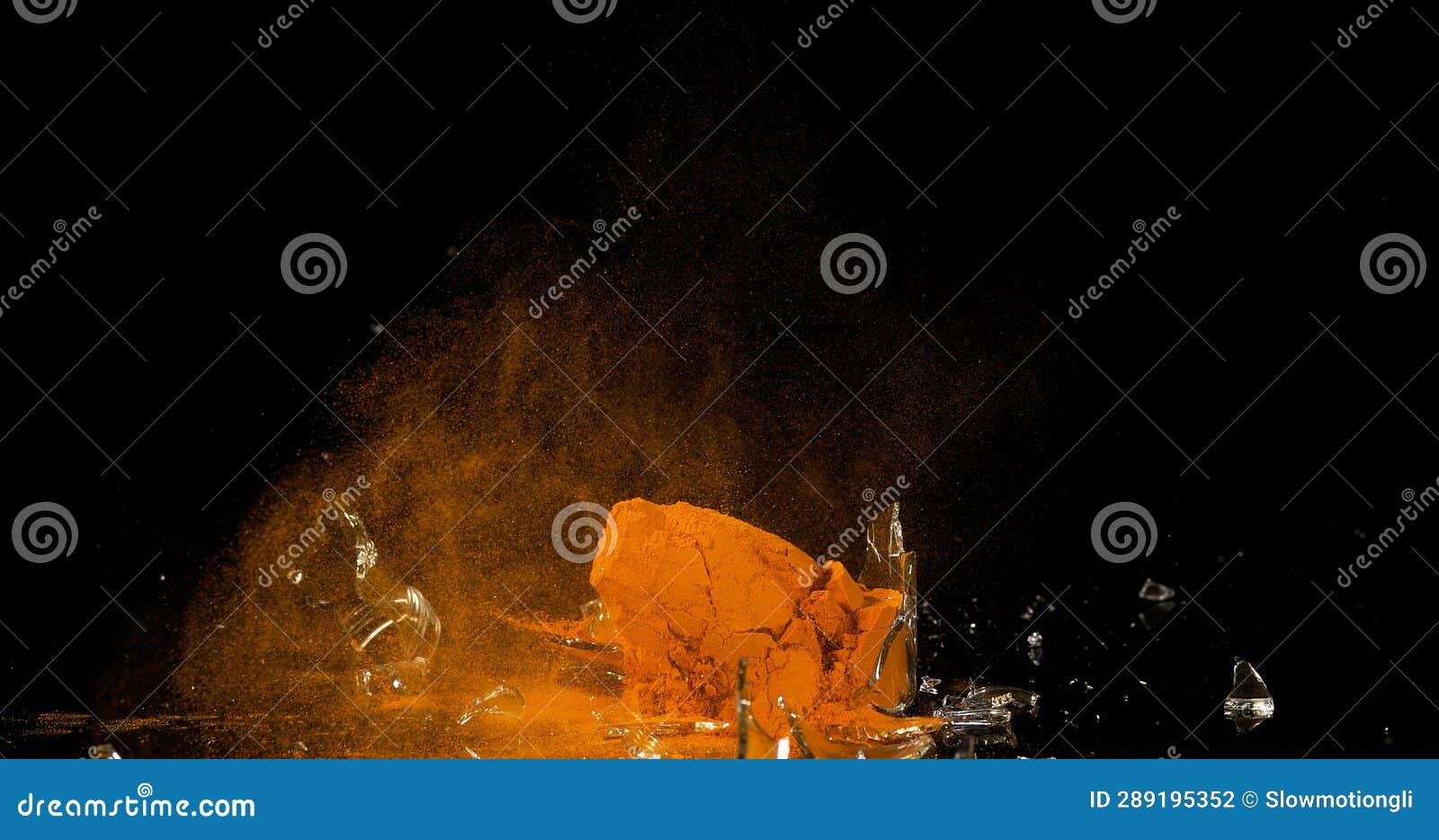 Turmeric, Curcuma Longa, Powder in a Small Jar Exploding Against Black ...