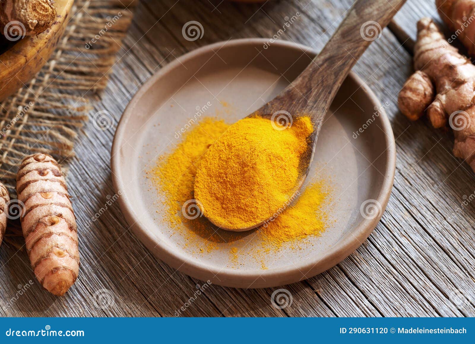Turmeric Powder and Fresh Root on a Table Stock Photo - Image of ...