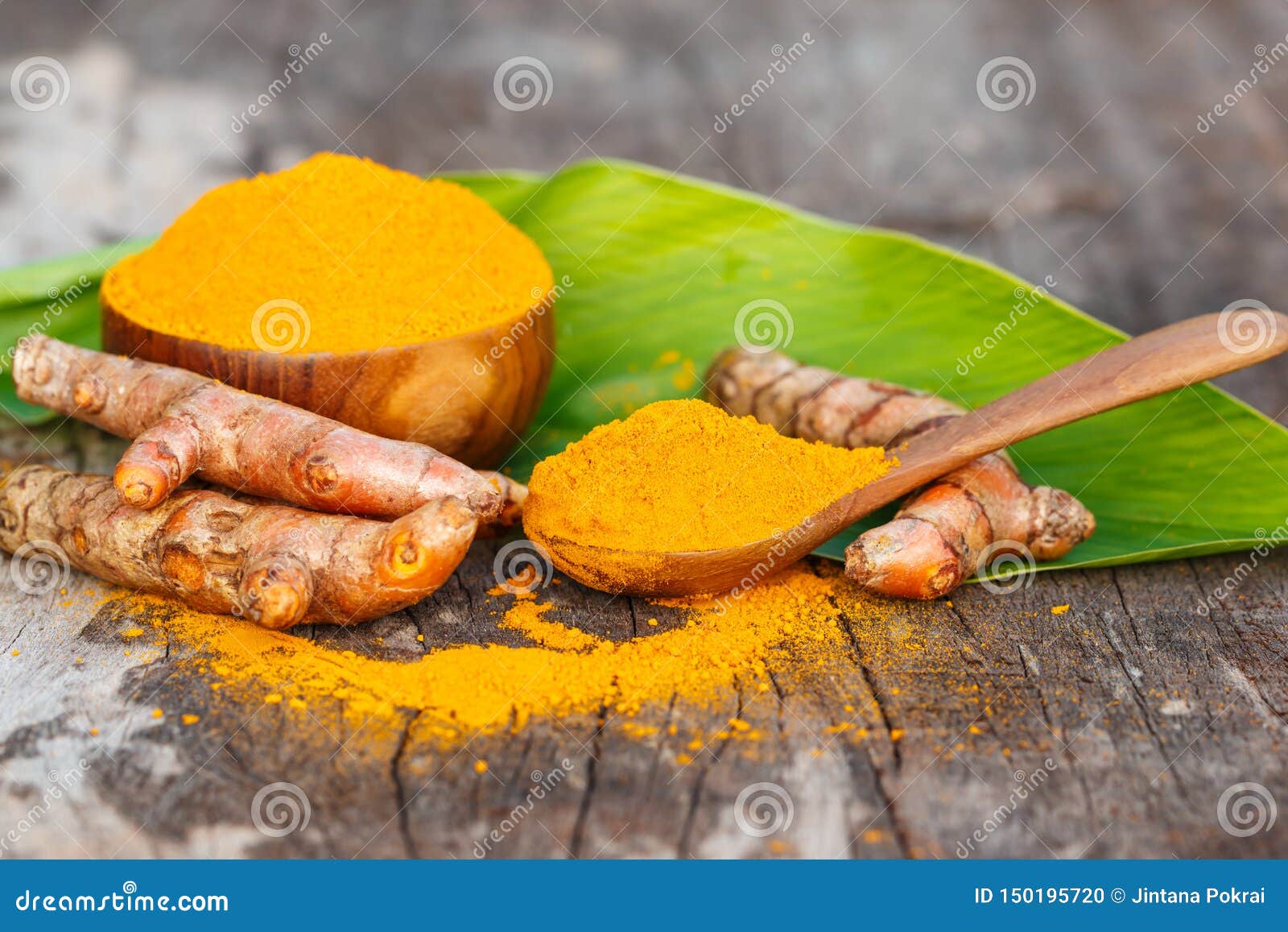 Turmeric Powder in Wooden Bowls on Wooden Table Stock Photo - Image of ...