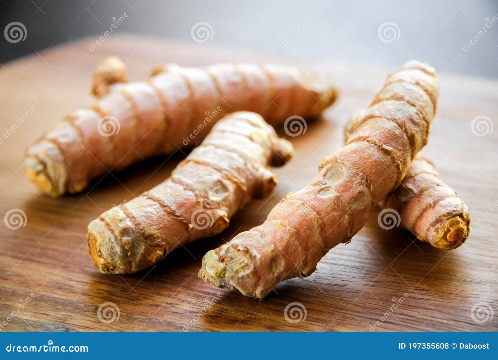 Turmeric Root on a Cutting Board Stock Photo - Image of food, orange ...