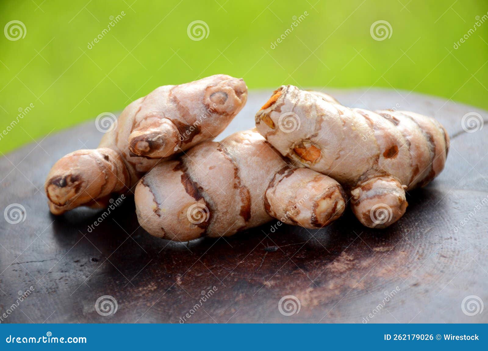 Turmeric Roots on a Tree Stump in a Natural Environment Stock Photo ...
