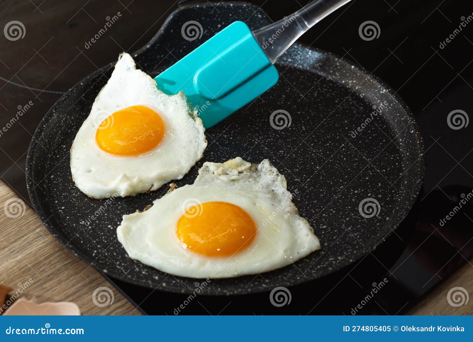Turn Over of Fried Eggs with Spatula in a Frying Pan Stock Image ...