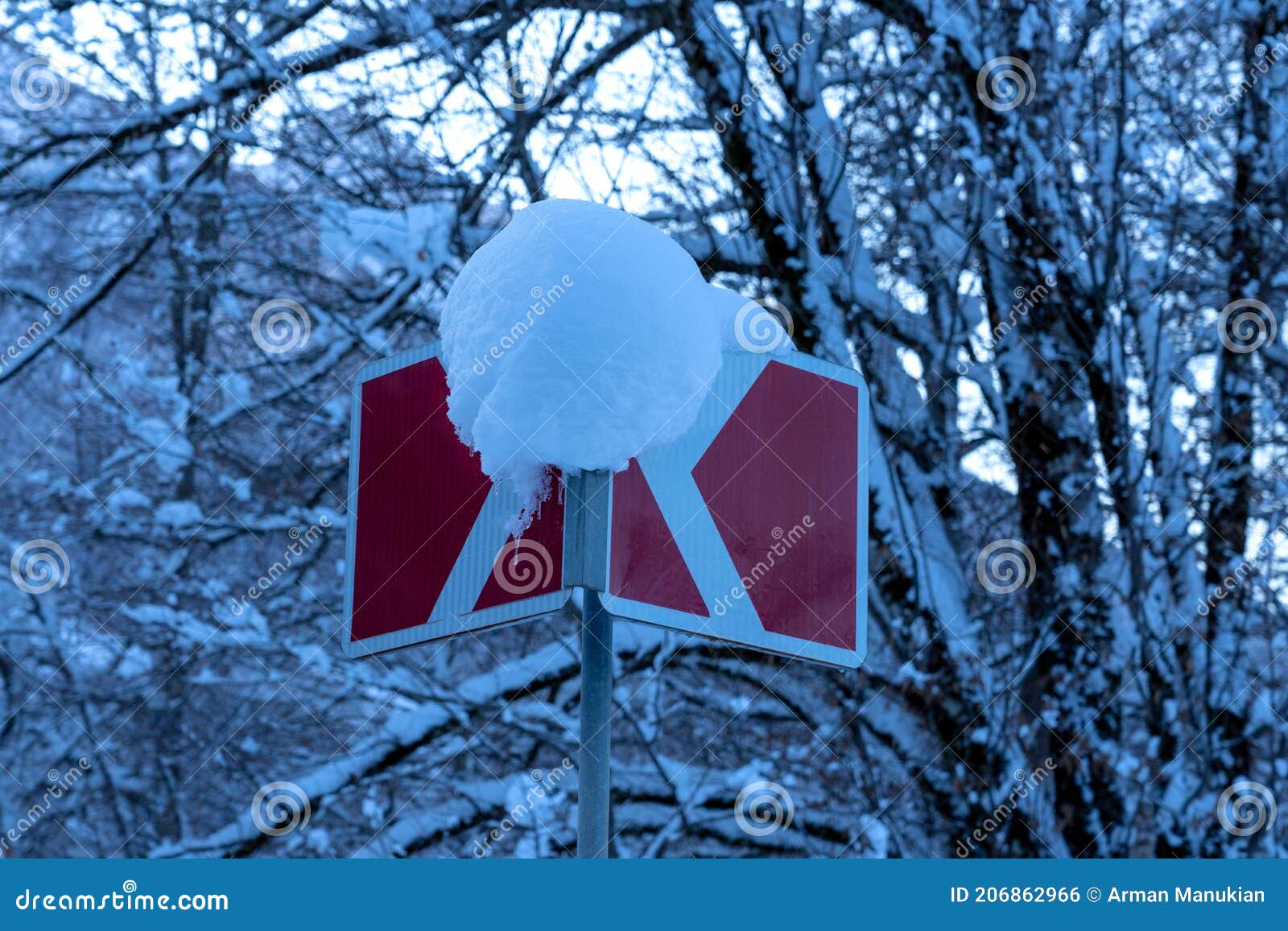 Turn Traffic Sign Under Snow, Showing the Way Stock Photo - Image of ...