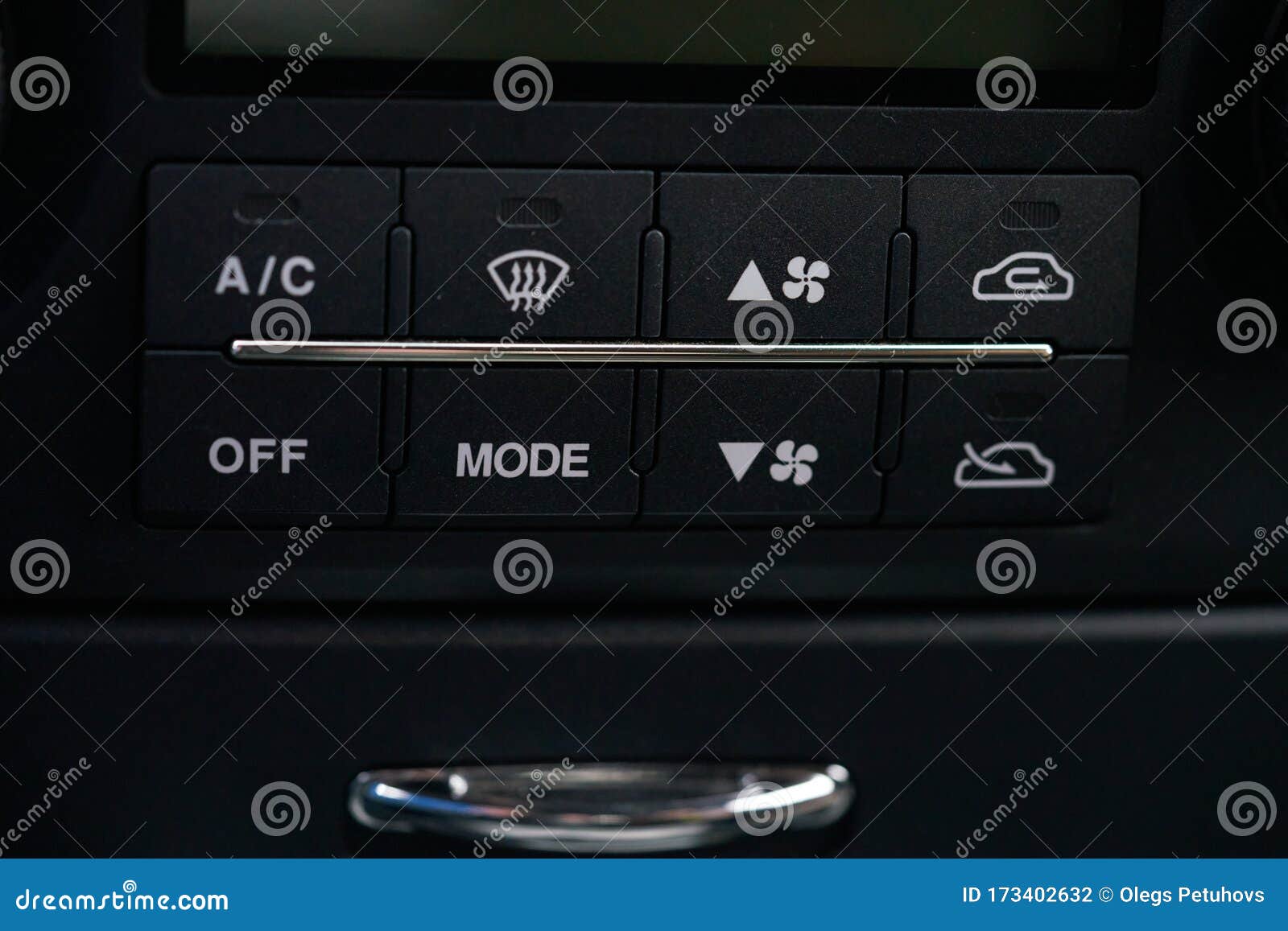 Turning on the Air Conditioning of a Car on the Climate Control Panel ...