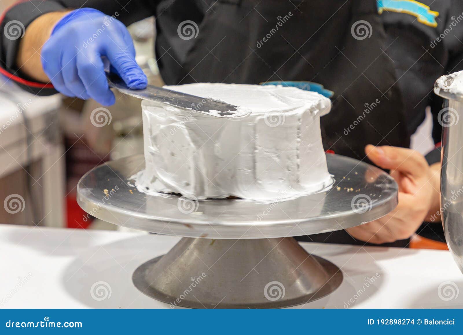 Turning Cake stock photo. Image of spinning, pastry - 192898274