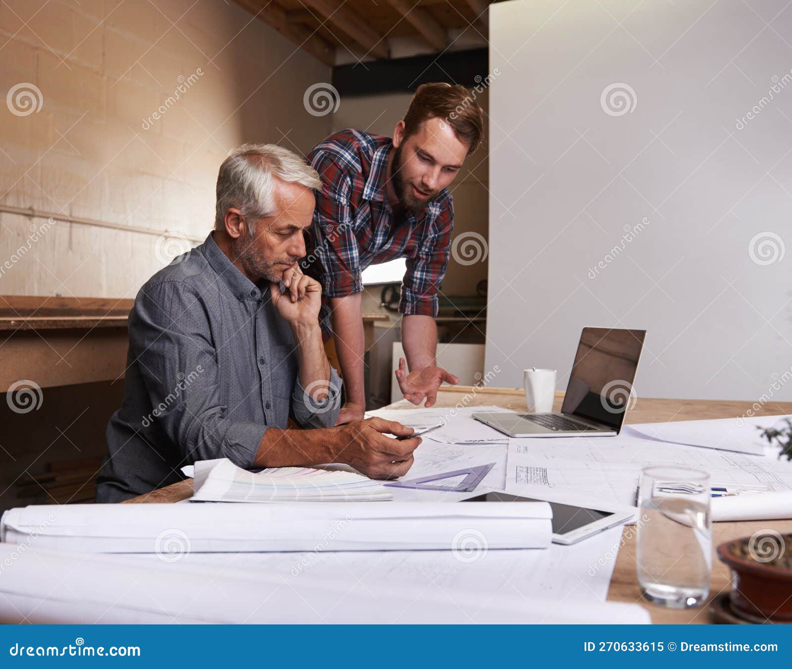 Turning His Vision into Reality. an Architect Drawing Up Plans. Stock ...