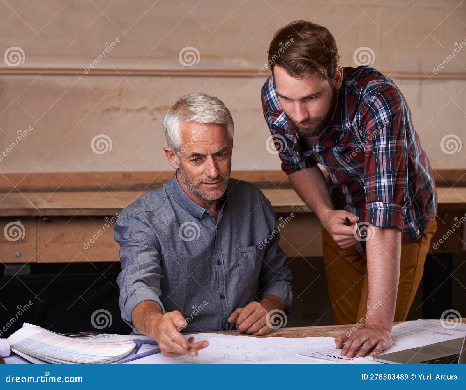 Turning His Vision into Reality. an Architect Drawing Up Plans. Stock ...