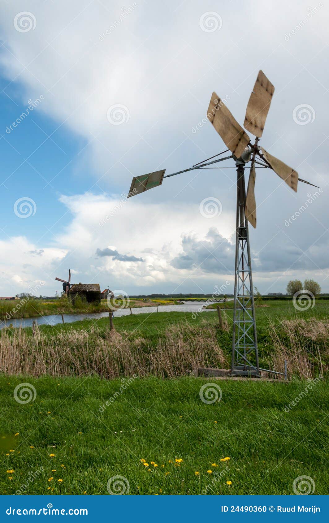 Turning old metal windmill stock photo. Image of cloud - 24490360