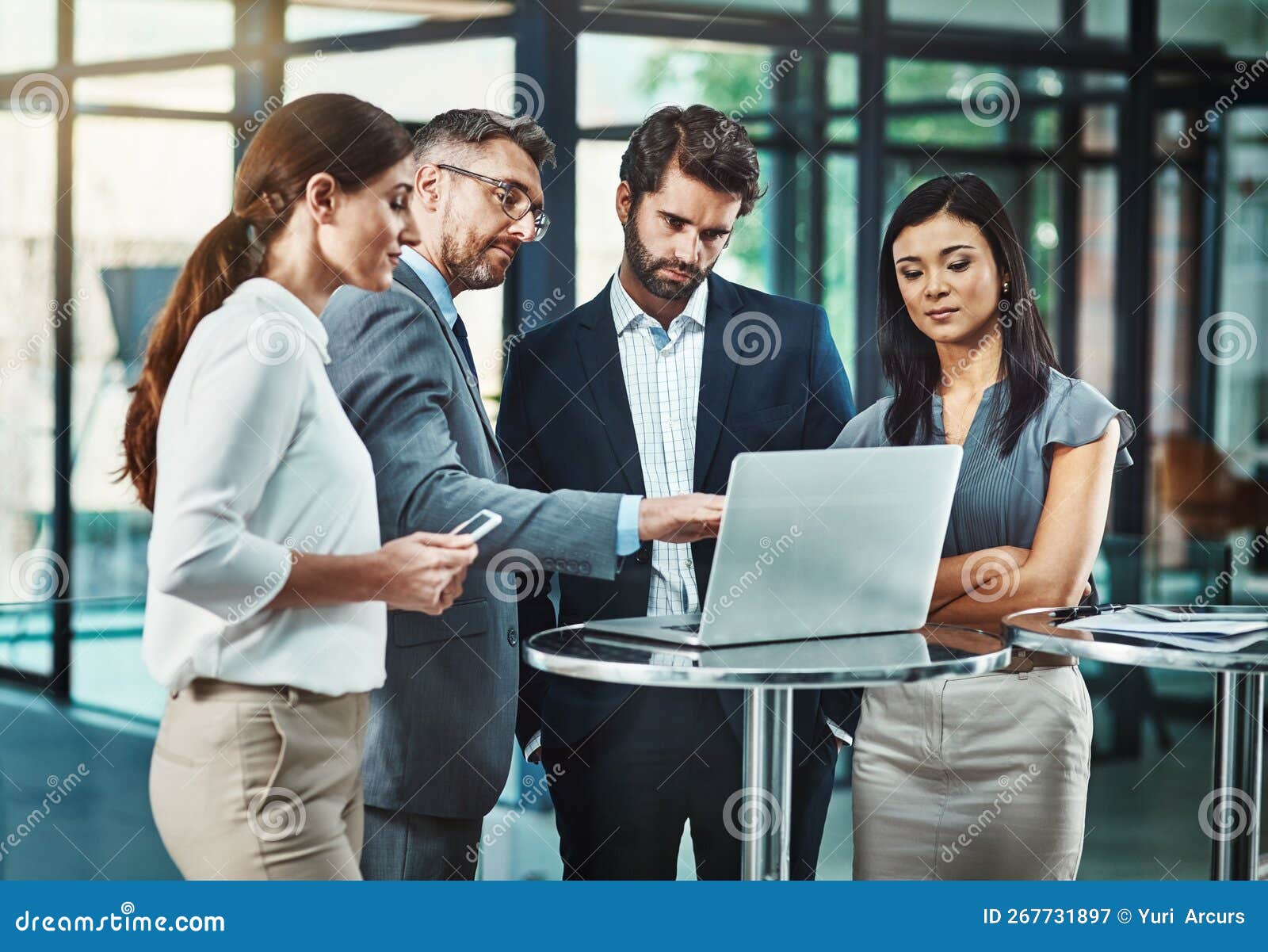 Turning Technology into a Productivity Machine. a Group of Colleagues ...