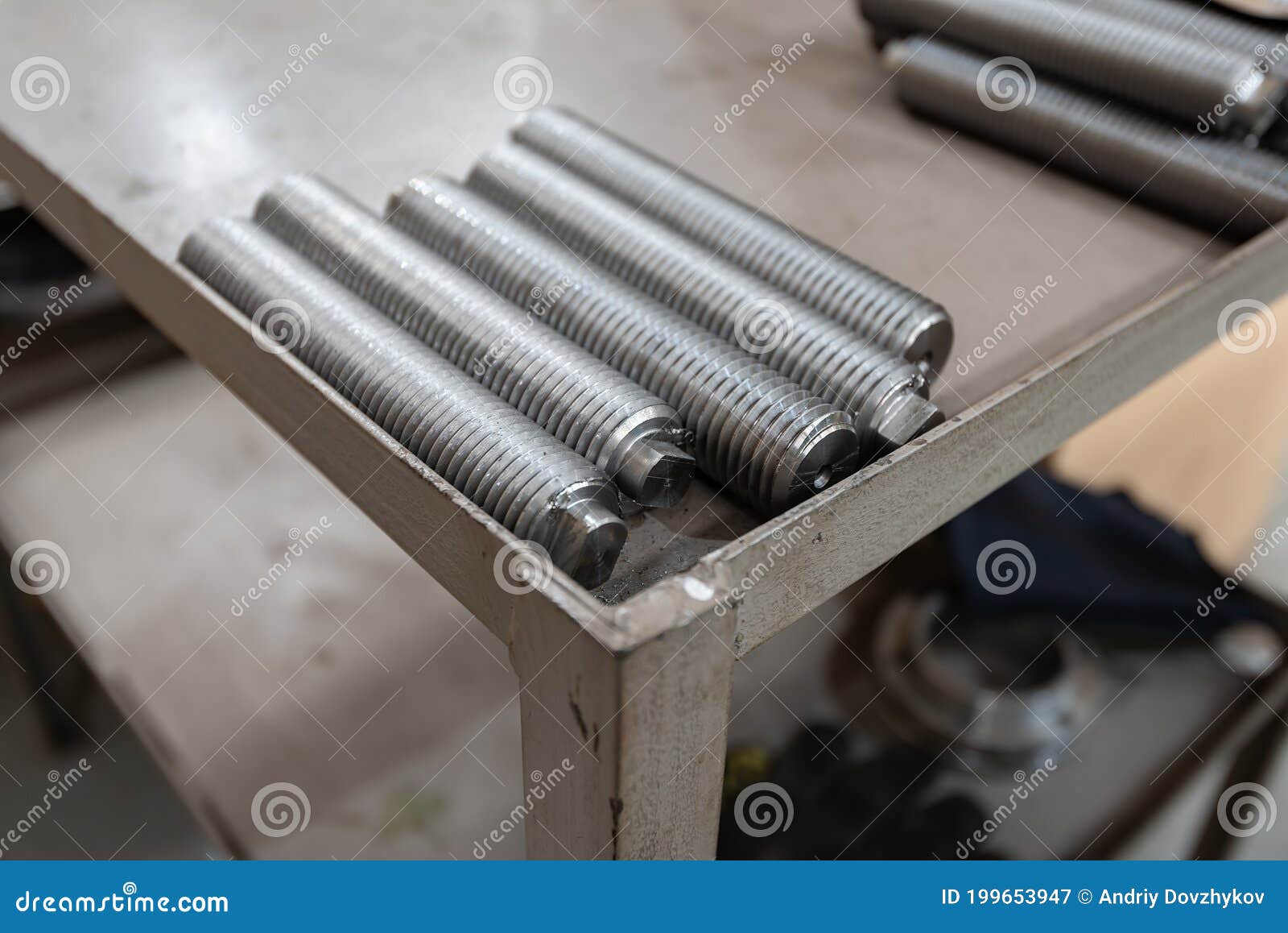 After Turning, the Threaded Rods are on the Rack Stock Image - Image of ...