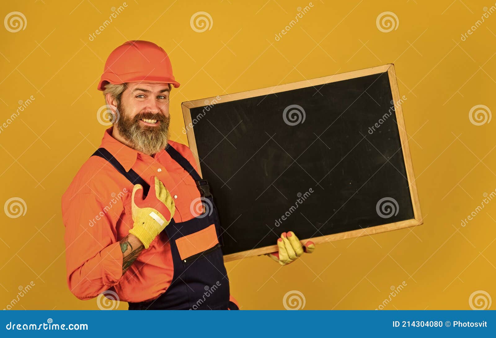 Turnkey Project. Happy Man with Presentation. Builder Points To ...