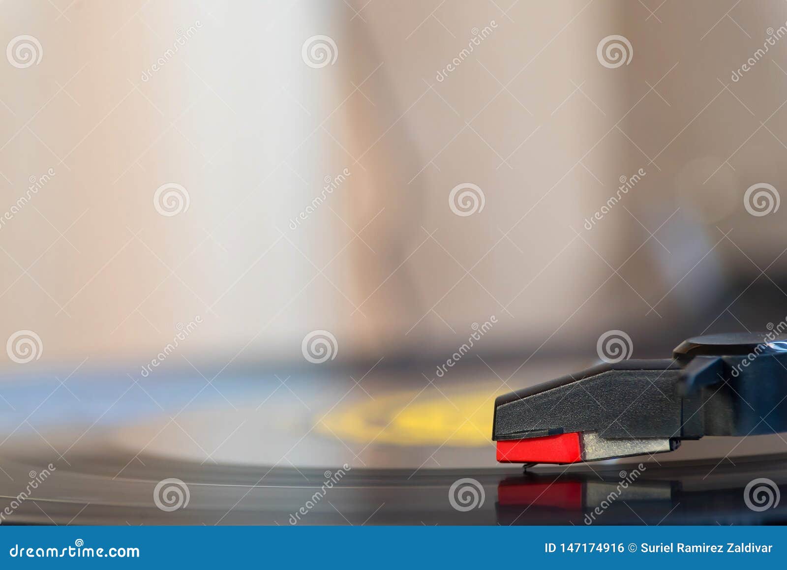 Turntable playing a vinyl stock photo. Image of record - 147174916