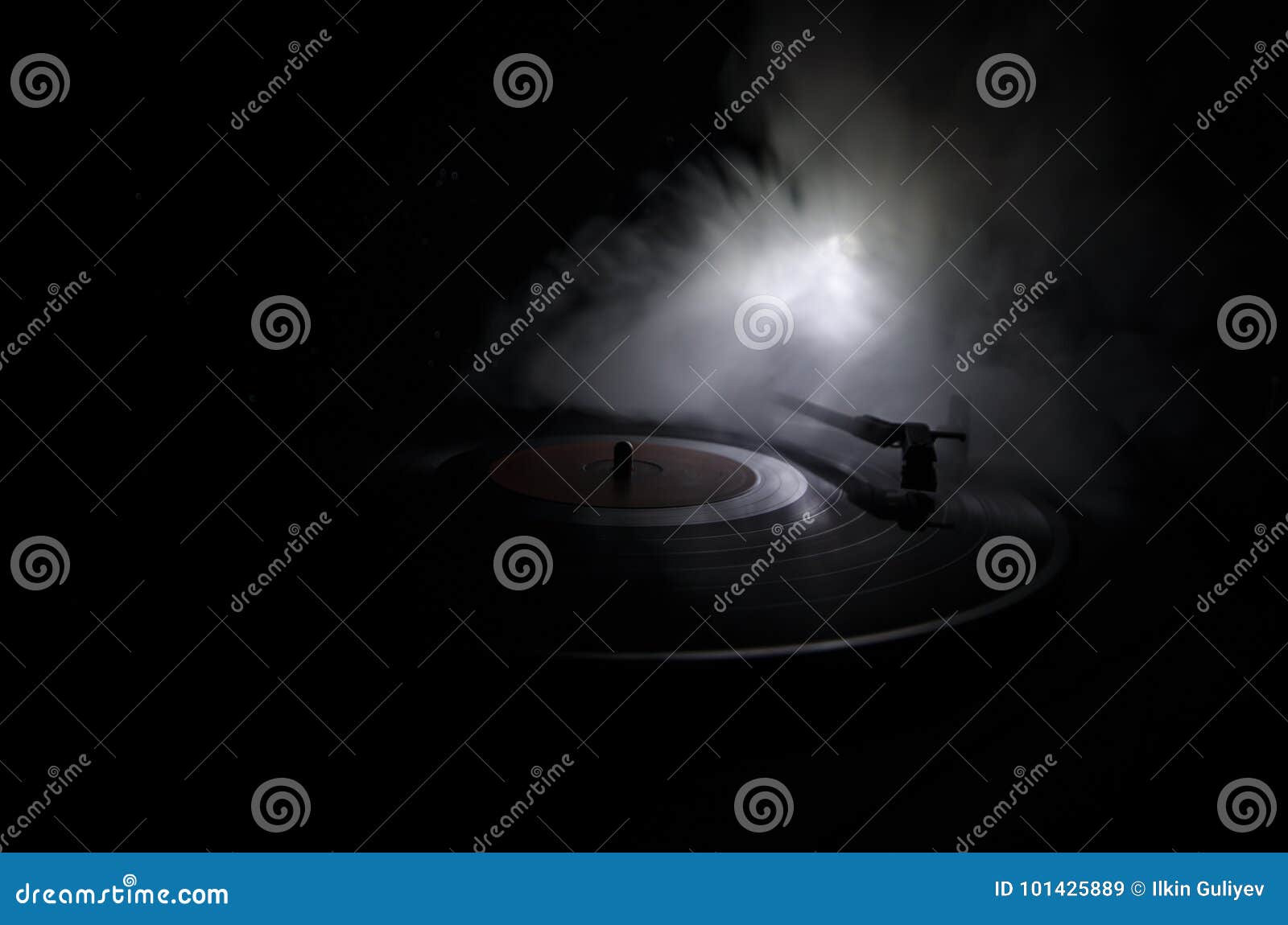 Turntable Playing Vinyl with Glowing Abstract Lines Concept on Dark ...