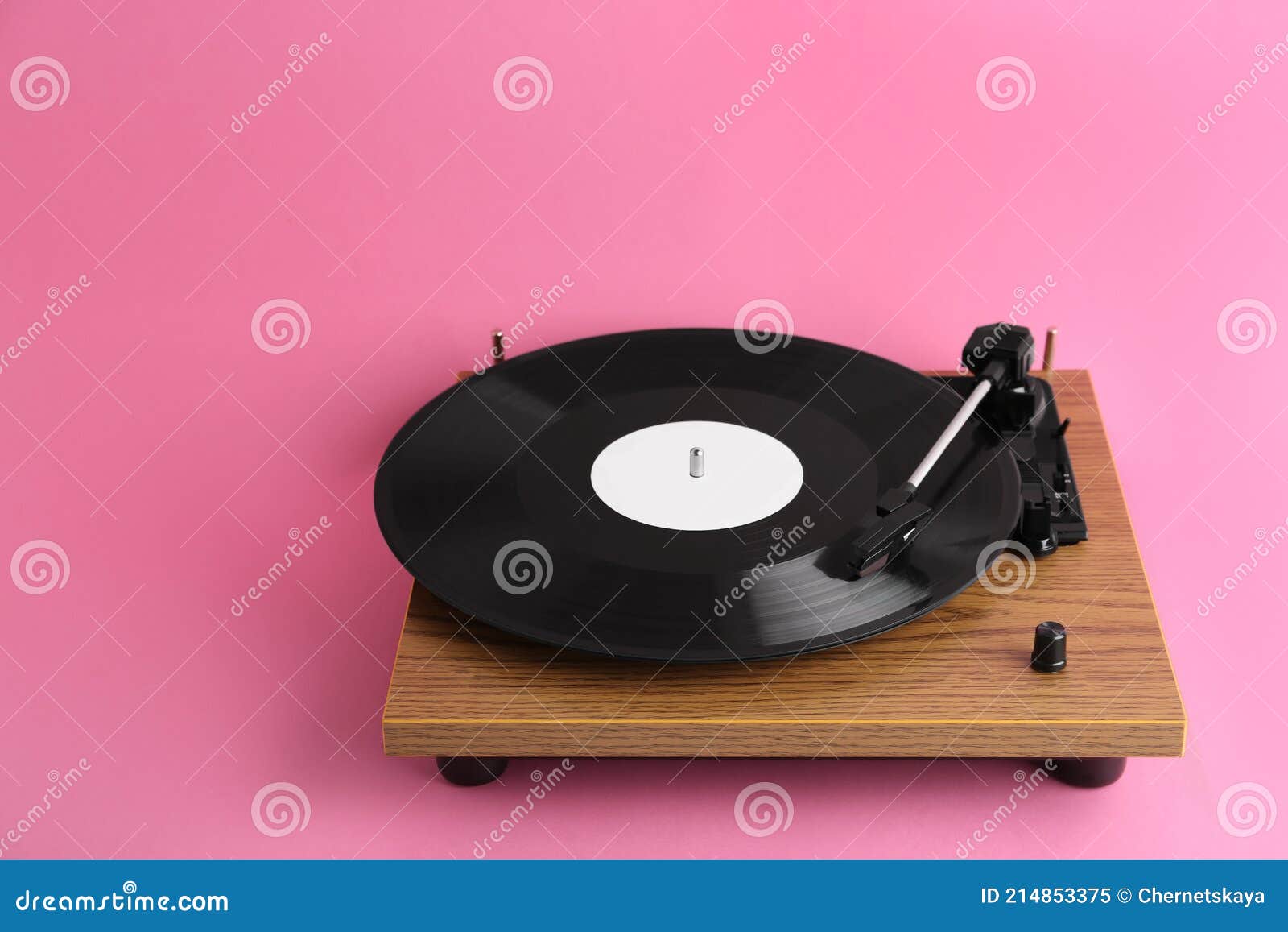 Turntable with Vinyl Record on Pink Background. Space for Text Stock ...