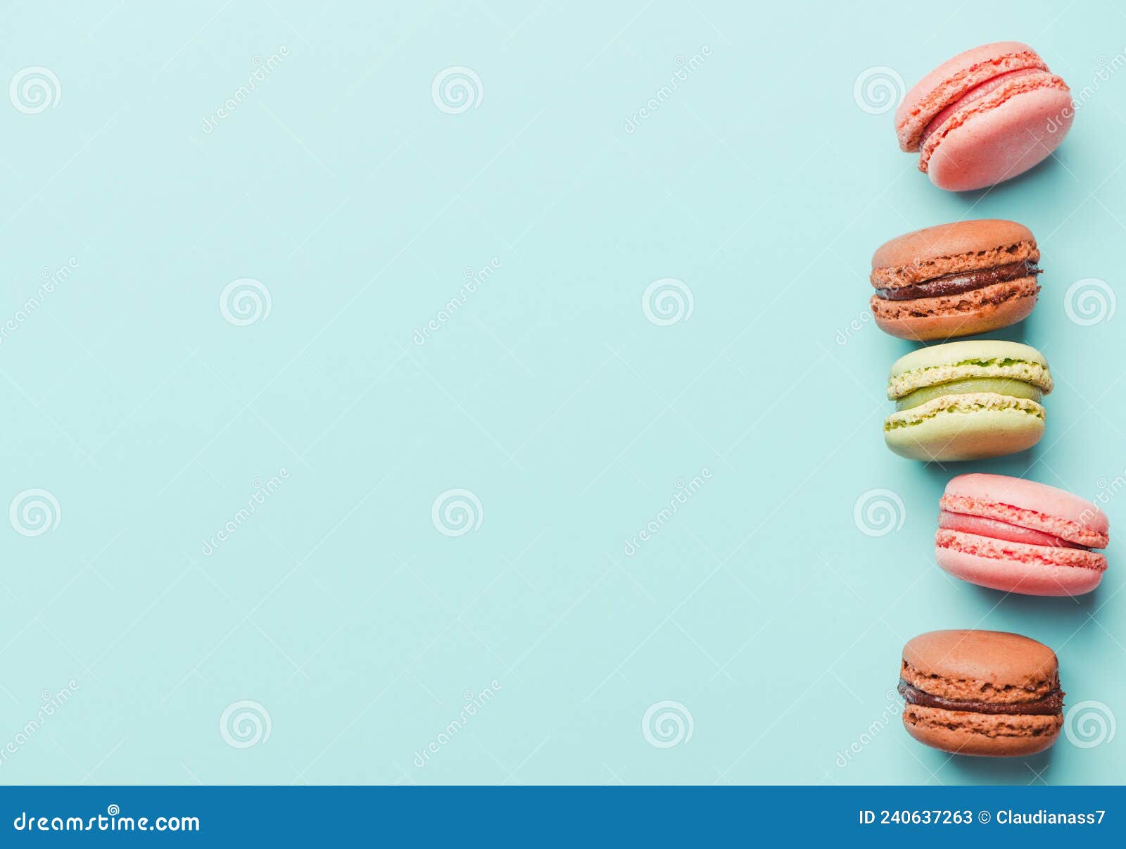 Turquoise Background with Five Macarons on the Right Side Stock Image ...