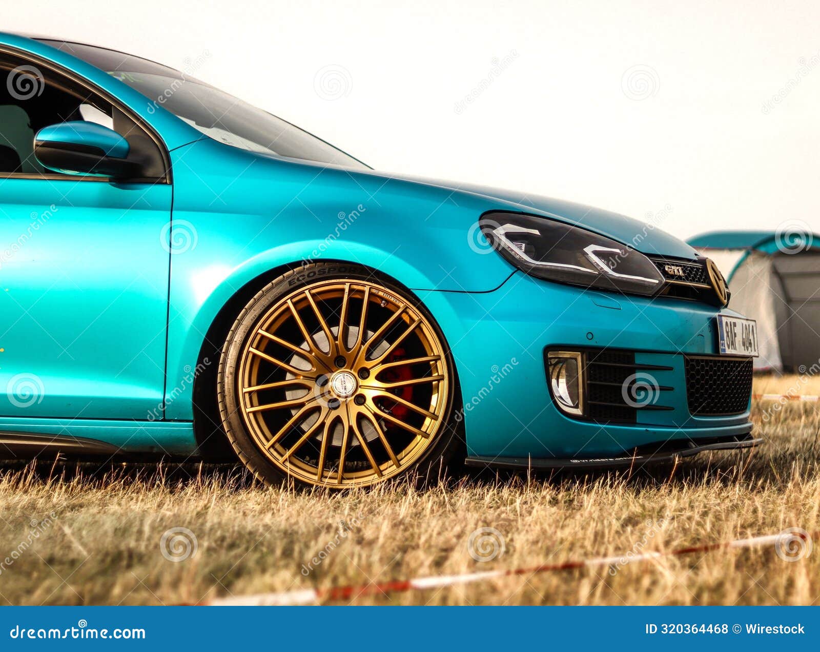 Turquoise-colored Car with Gold Rims and Wheels Editorial Stock Photo ...