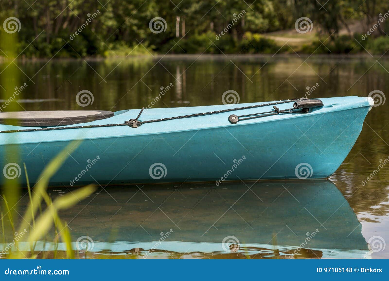 Turquoise Kayak by the River Stock Photo - Image of reflection, camping ...