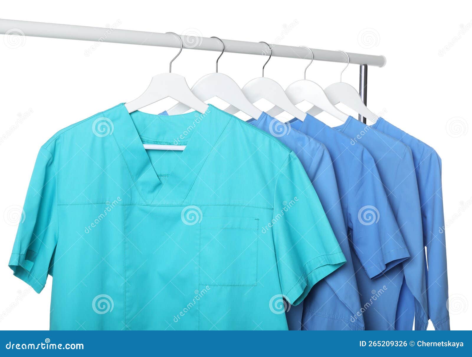 Turquoise and Light Blue Medical Uniforms on Rack Against White ...