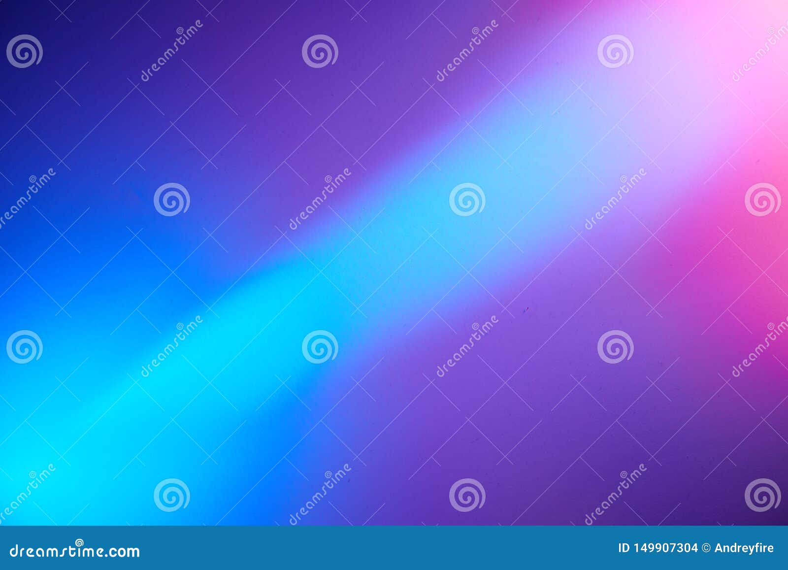 Turquoise Ray with a Transition To a Pink Spot of Light Separating the ...