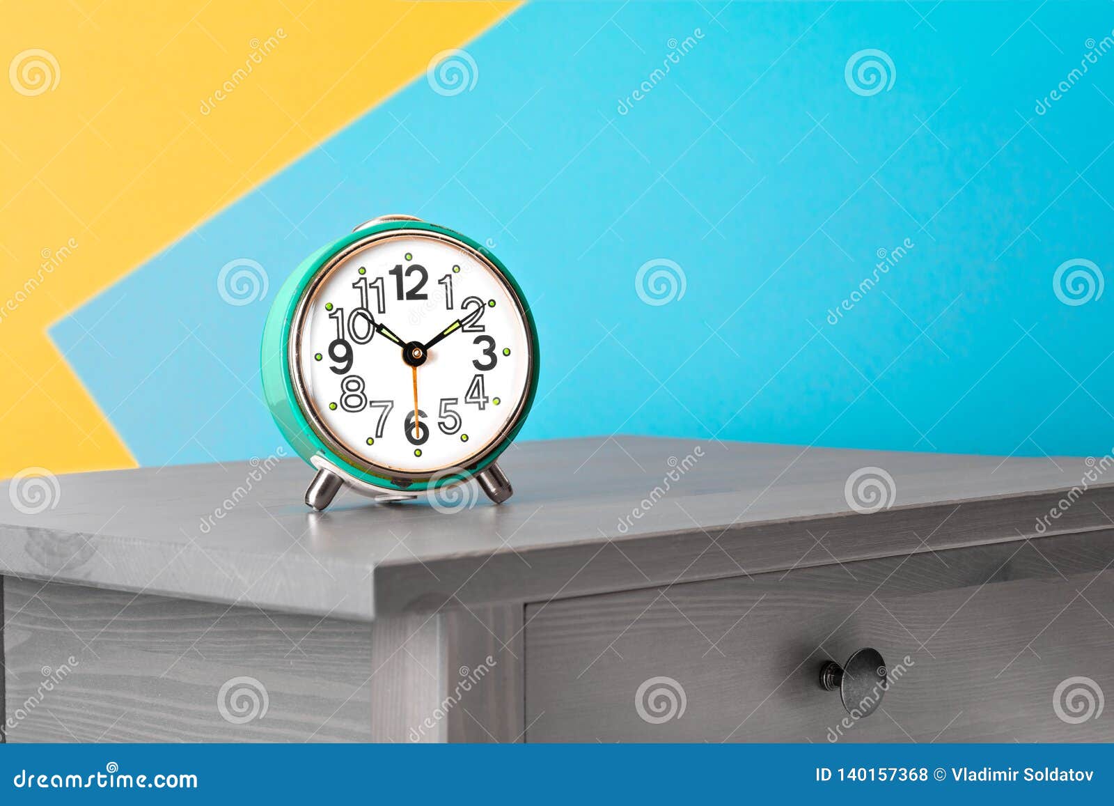 Turquoise Retro Alarm Clock on the Bedside Table Stock Photo - Image of ...