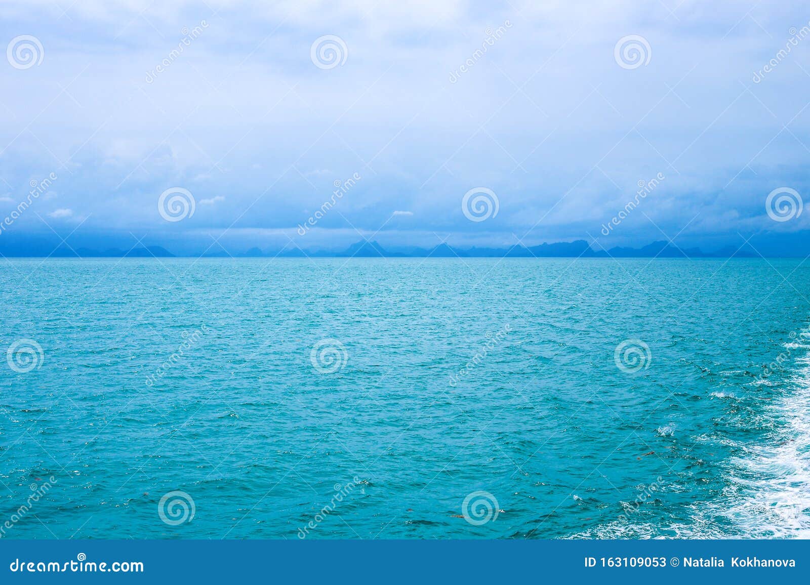 Turquoise Sea and Distant Coast Stock Image - Image of beautiful ...
