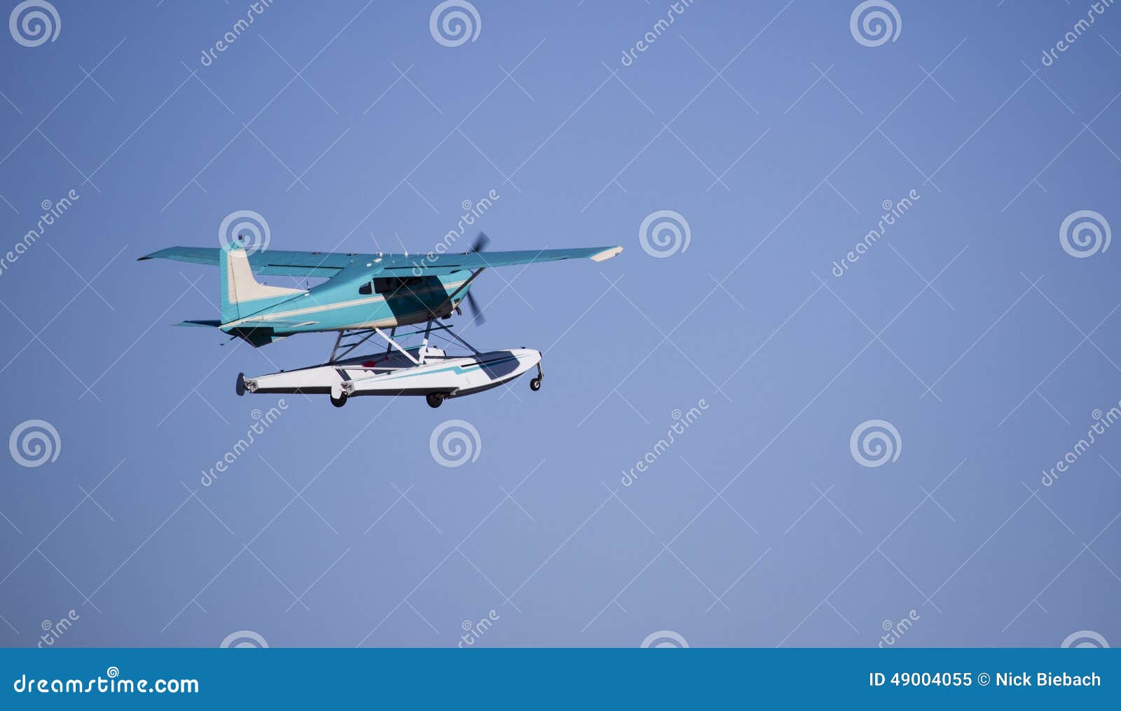 Turquoise Sea Plane Taking Off Stock Image - Image of seaplane, plane ...