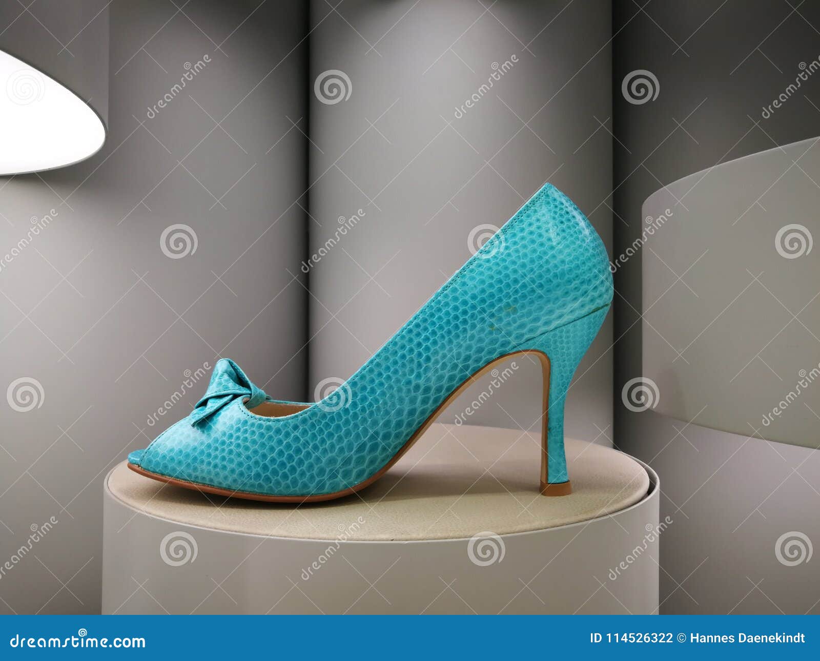 Turquoise Snake Leather Stiletto on Display Stock Photo - Image of ...