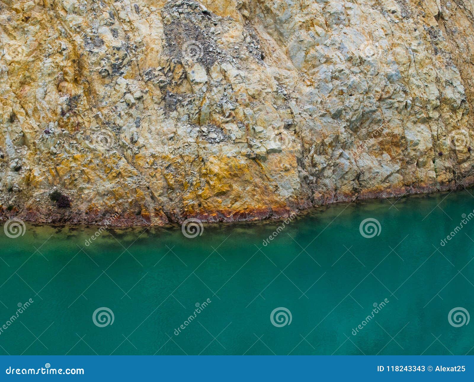 Turquoise water and rock stock image. Image of rock - 118243343