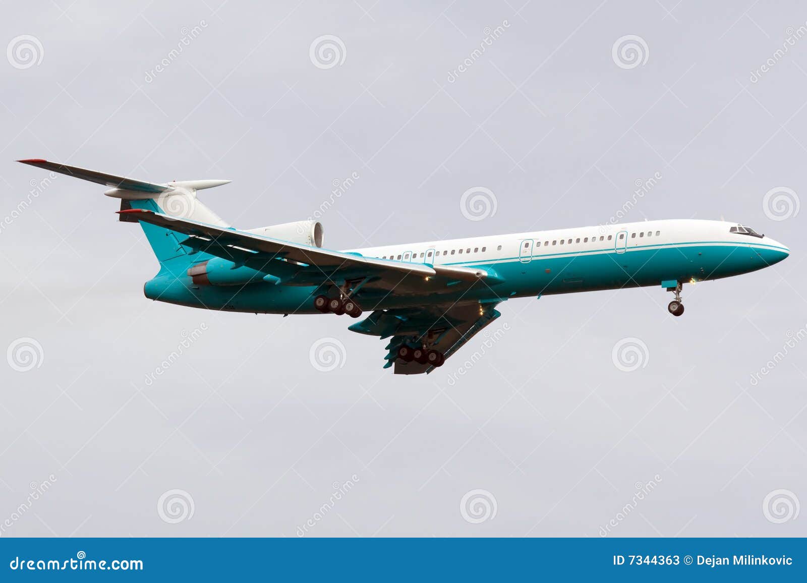 Turquoise-white airplane stock image. Image of aviation - 7344363