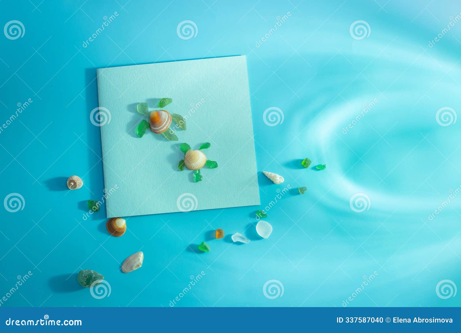 Turtle Design Using Seashells and Glass on Blue Sea Background. Large ...