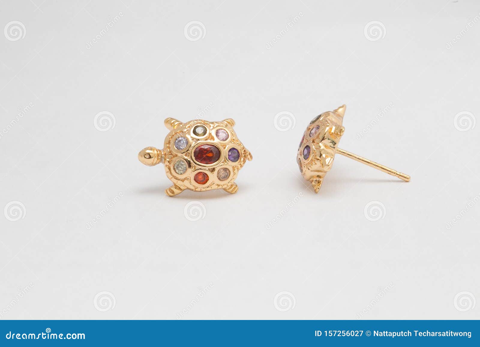 Turtle Shape Gold Earrings with Diamonds on the White Background Stock ...