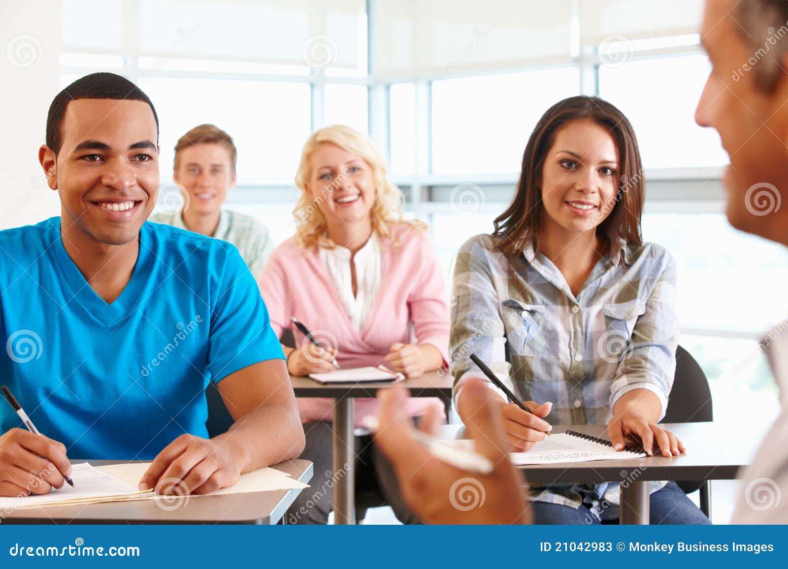 Tutor with Class of Students Stock Image - Image of listening ...