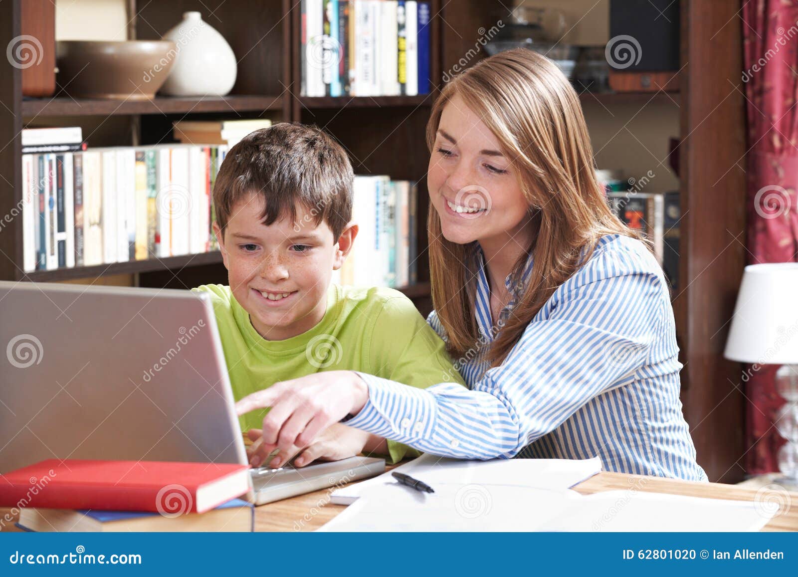 Tutor Helping Boy Studying at Home Stock Photo - Image of child ...